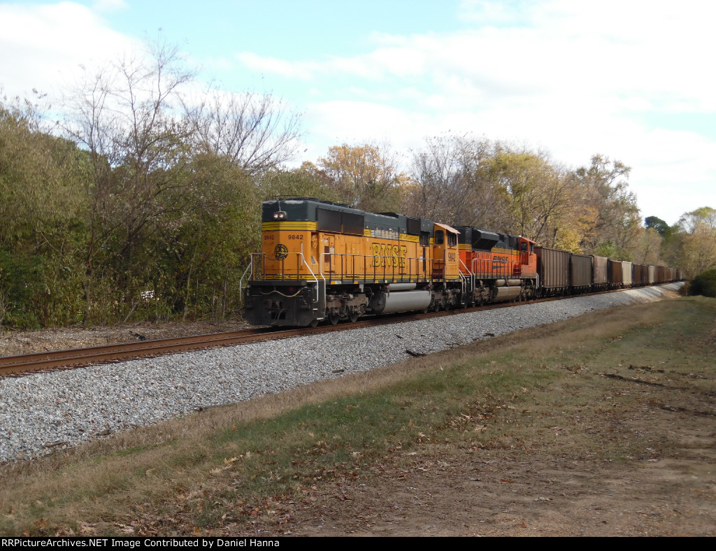 Two BNSF EMD DPU's shove hard on the rear of NS 736